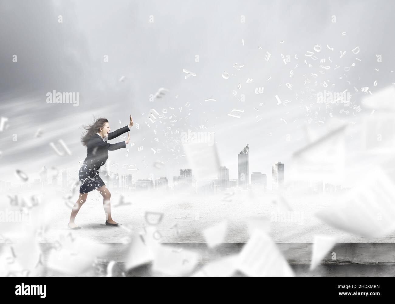 Woman fighting paperwork hi-res stock photography and images - Alamy