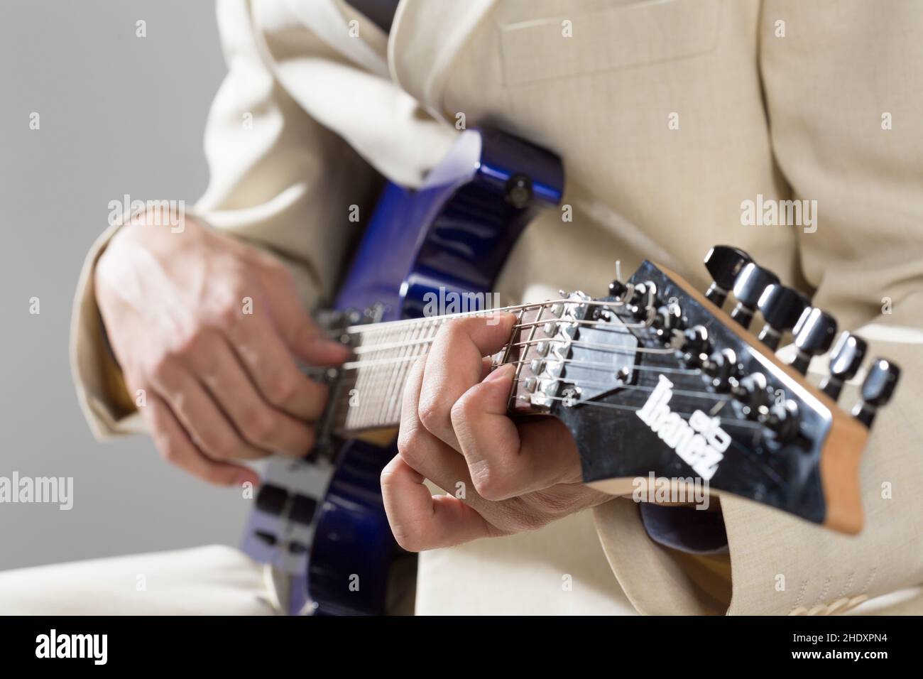 Guitarist playing solo guitar part hi-res stock photography and images ...