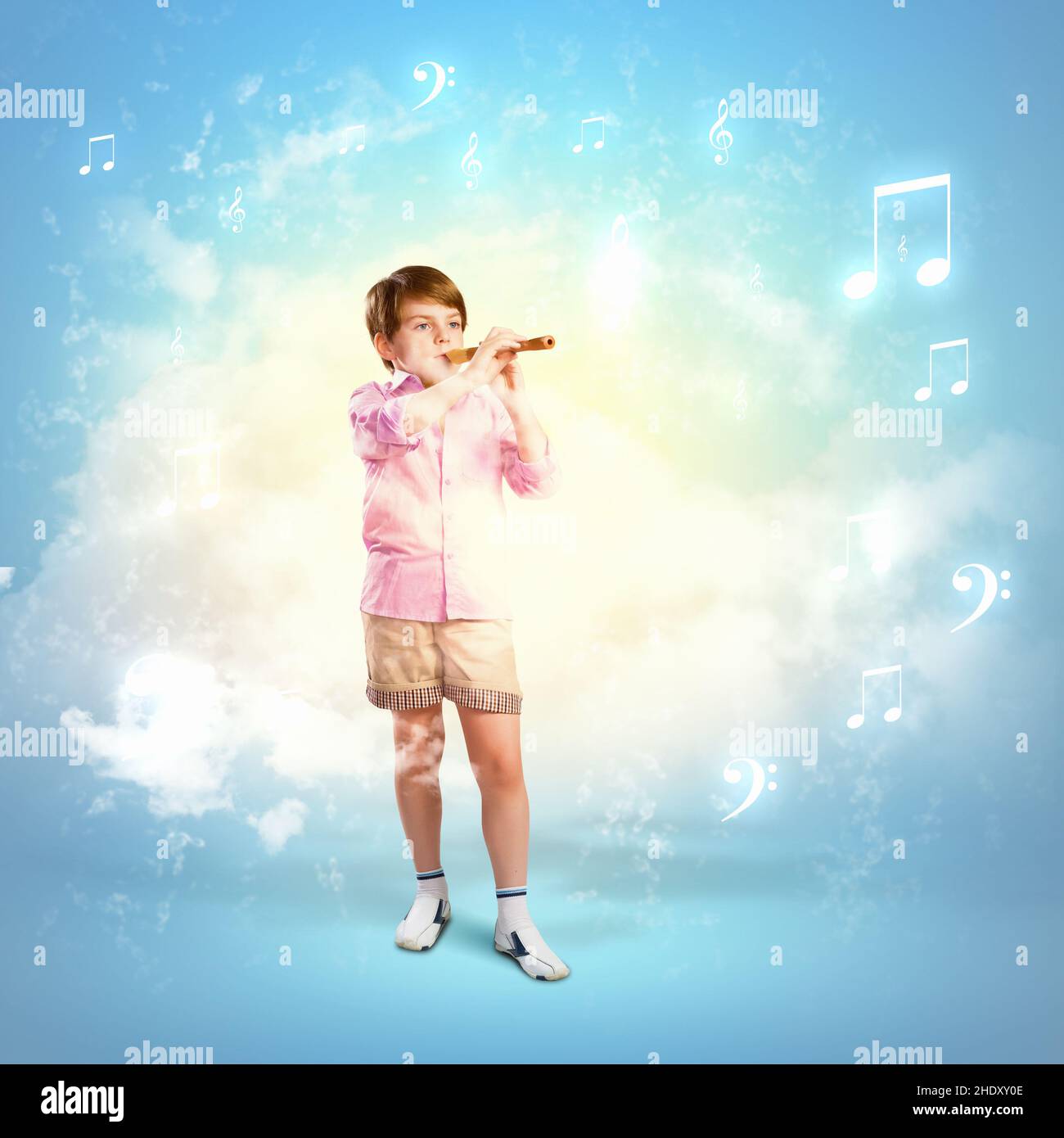 Flute playing boy hi-res stock photography and images - Alamy