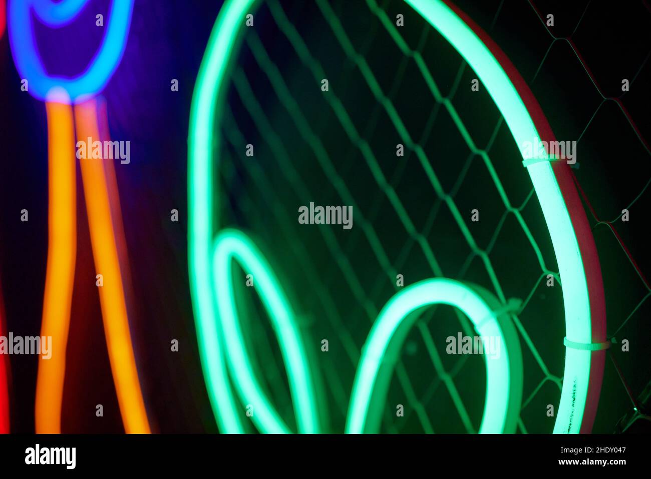 Abstact red neon sign with a blue neon tube Stock Photo - Alamy