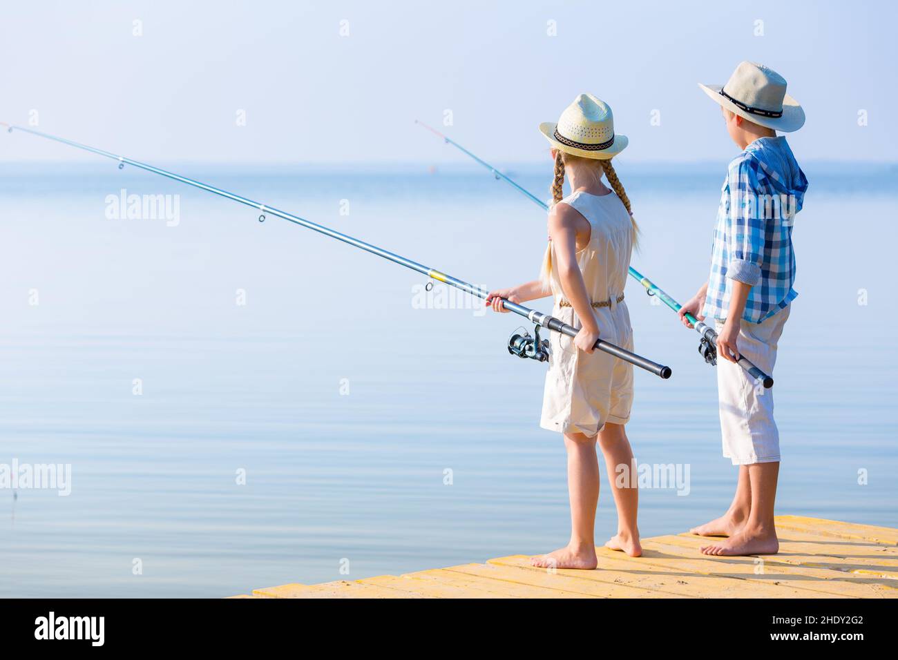 Child children boy girl fish fishing hi-res stock photography and ...