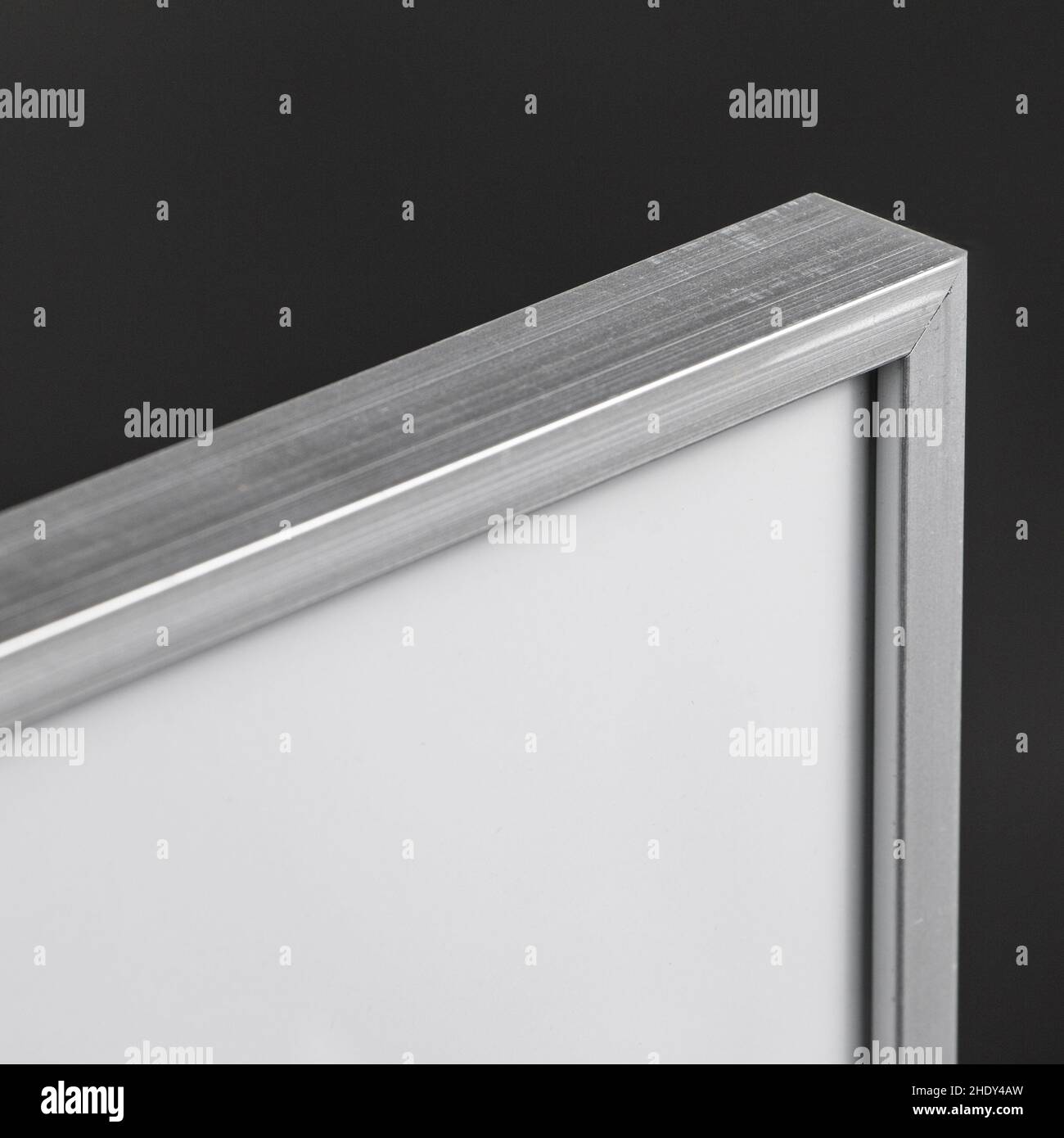 Image made in studio of an detail empty aluminum photo frame. Graphic ...
