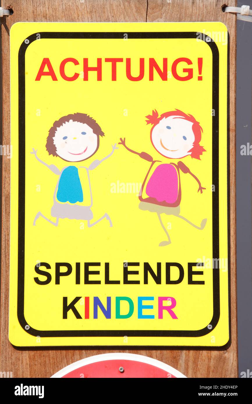Children playing road signs warning hi-res stock photography and images ...