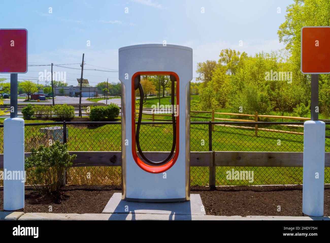 petrol pump, electric car, pumps, electric cars Stock Photo - Alamy