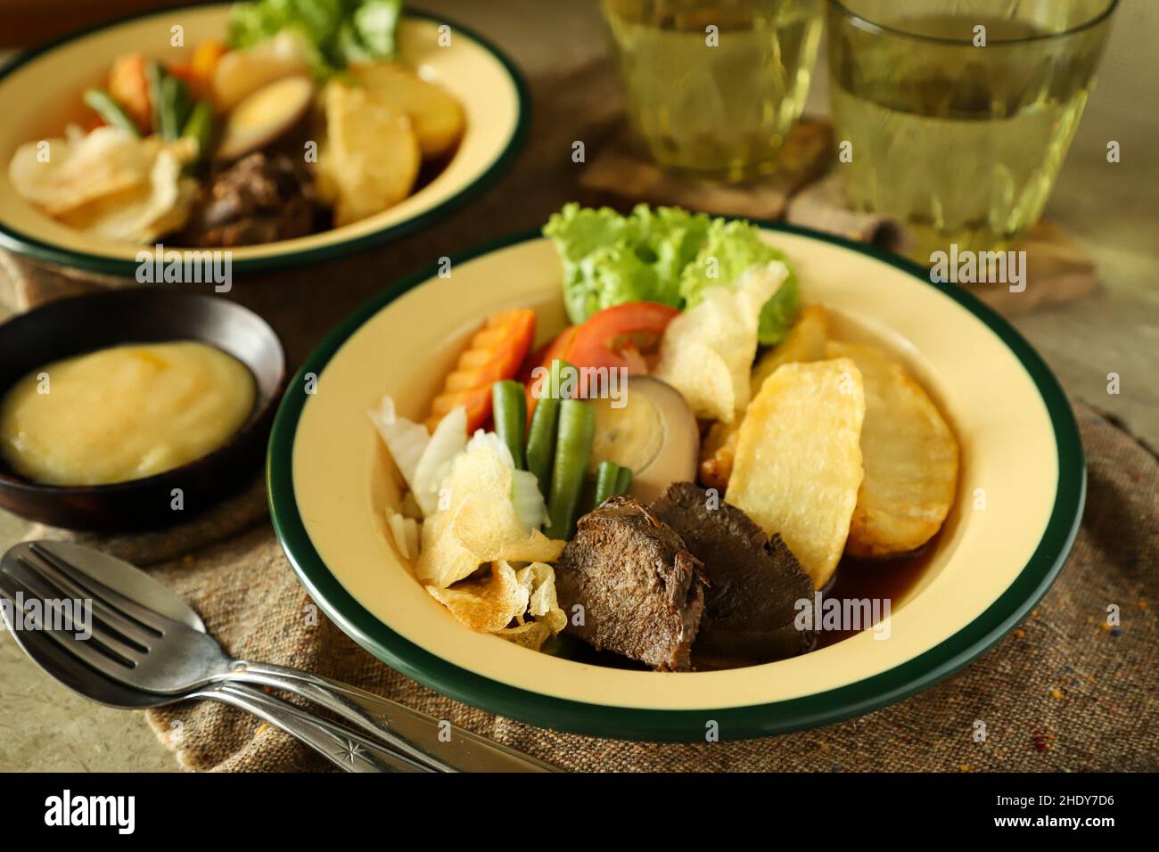 Selat Solo. Javanese style beef steak with potato wedges, soy braised ...