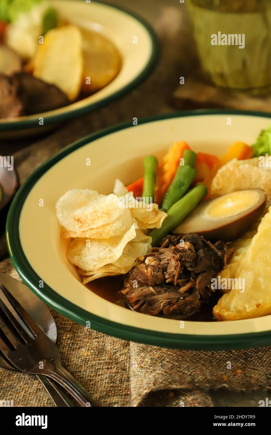 Selat Solo. Javanese style beef steak with potato wedges, soy braised ...