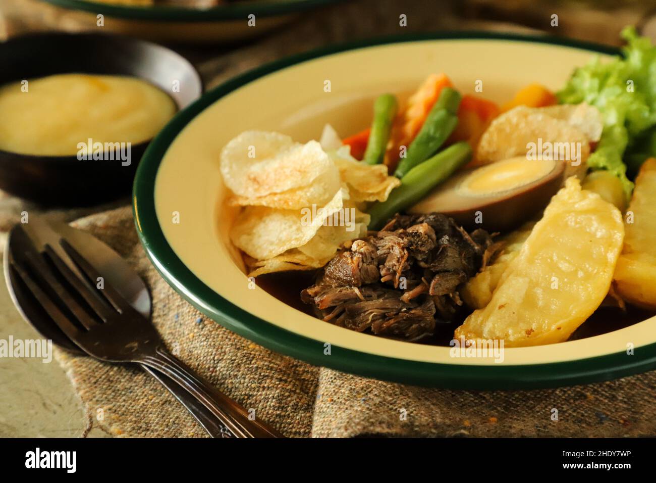 Selat Solo. Javanese style beef steak with potato wedges, soy braised ...