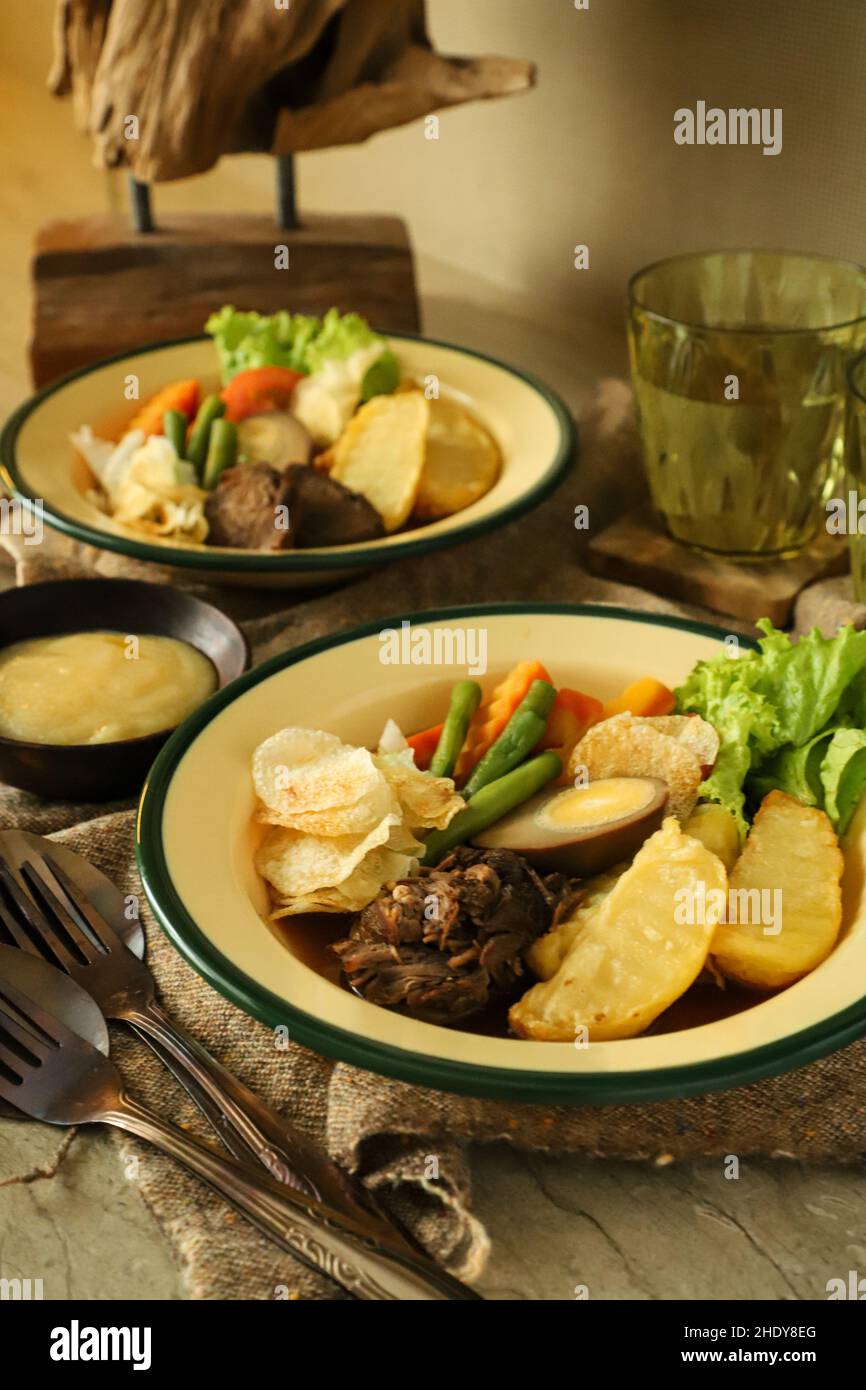 Selat Solo. Javanese style beef steak with potato wedges, soy braised ...