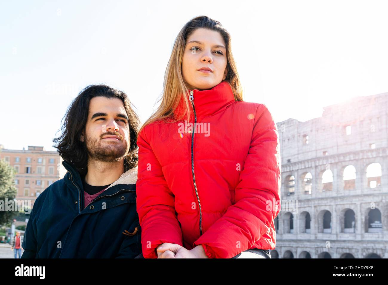 Young couple traveling to Rome. The beautiful couple posing in front of ...