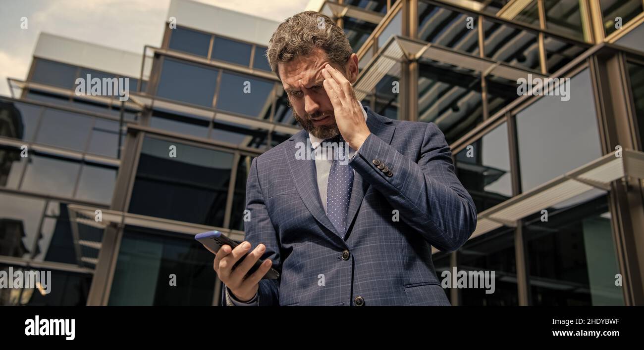 adult ceo with cellphone. phone call. mobile connection technology ...