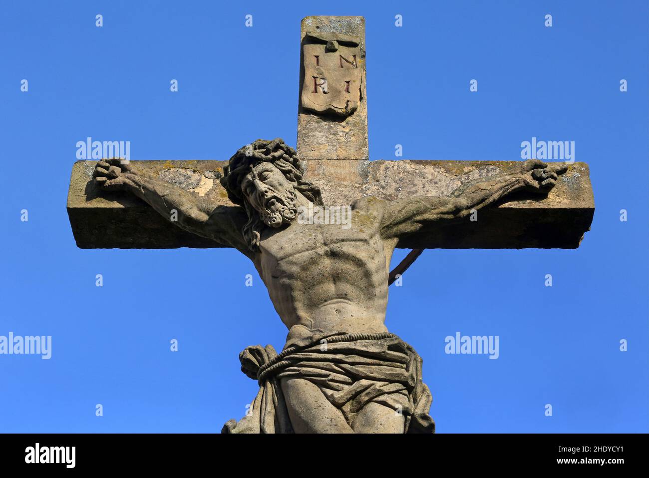 stone cross, christ figure, christ figures Stock Photo - Alamy