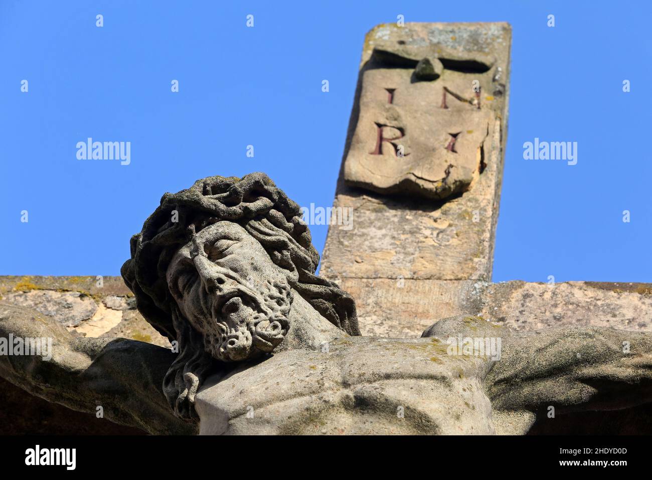 stone cross, christ figure, inri, christ figures, inris Stock Photo - Alamy