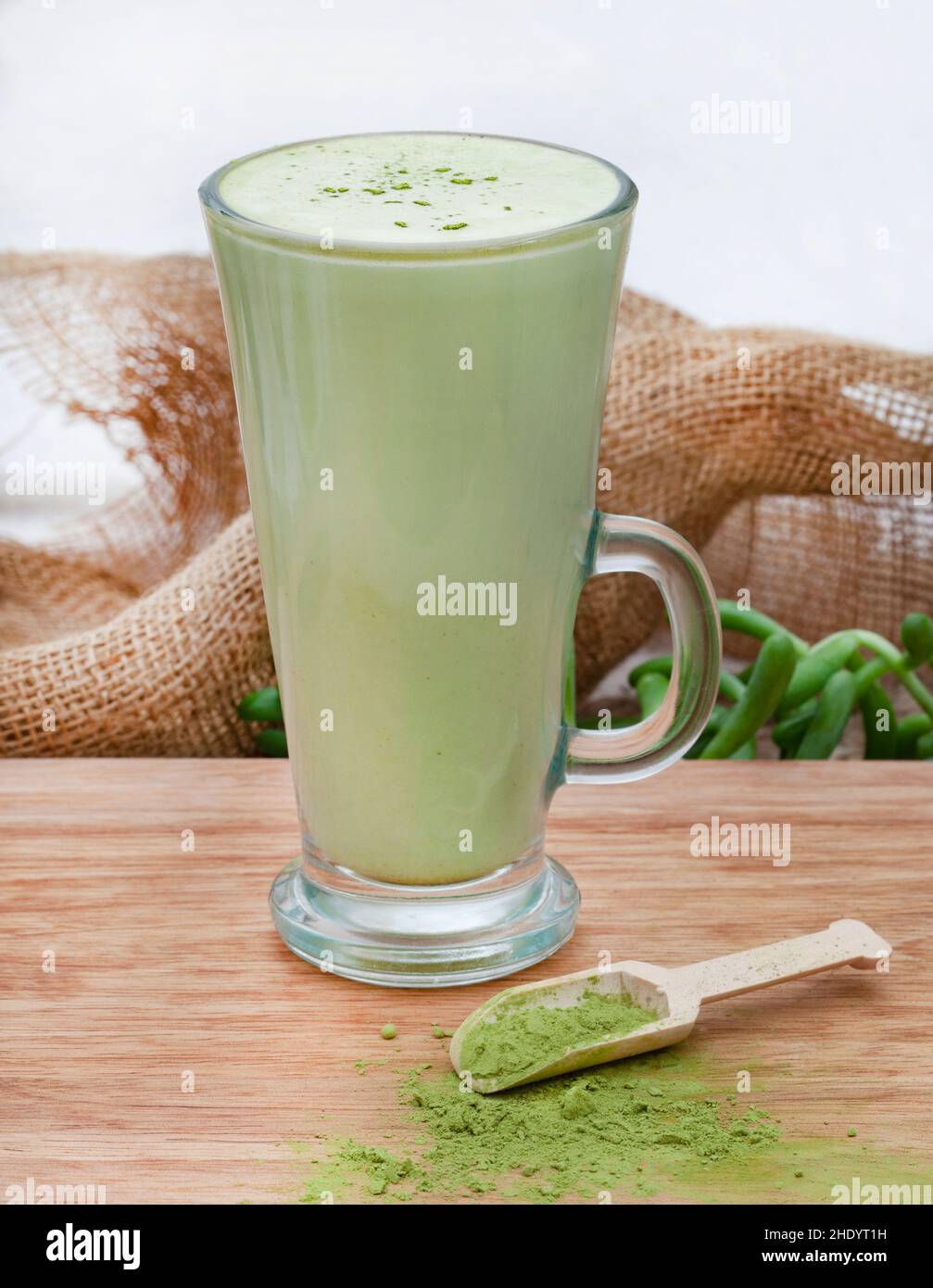 Matcha green tea latte with matcha powder Stock Photo - Alamy