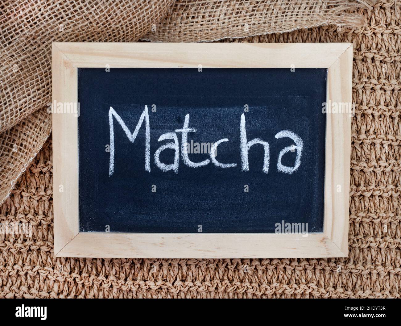 Matcha written on black chalkboard with rustic background Stock Photo ...