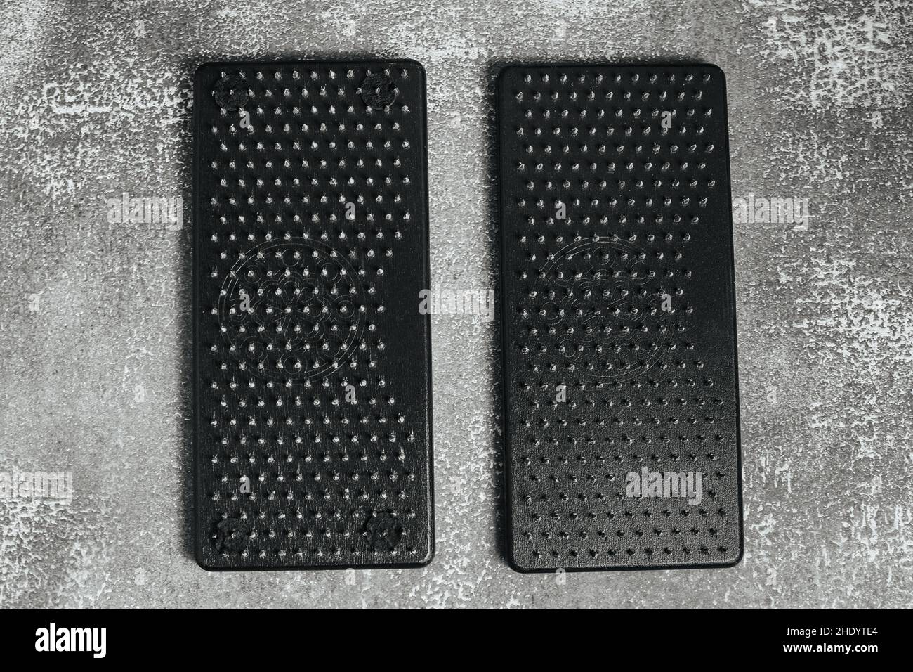 The concept of meditation, standing on nails, therapy Stock Photo - Alamy