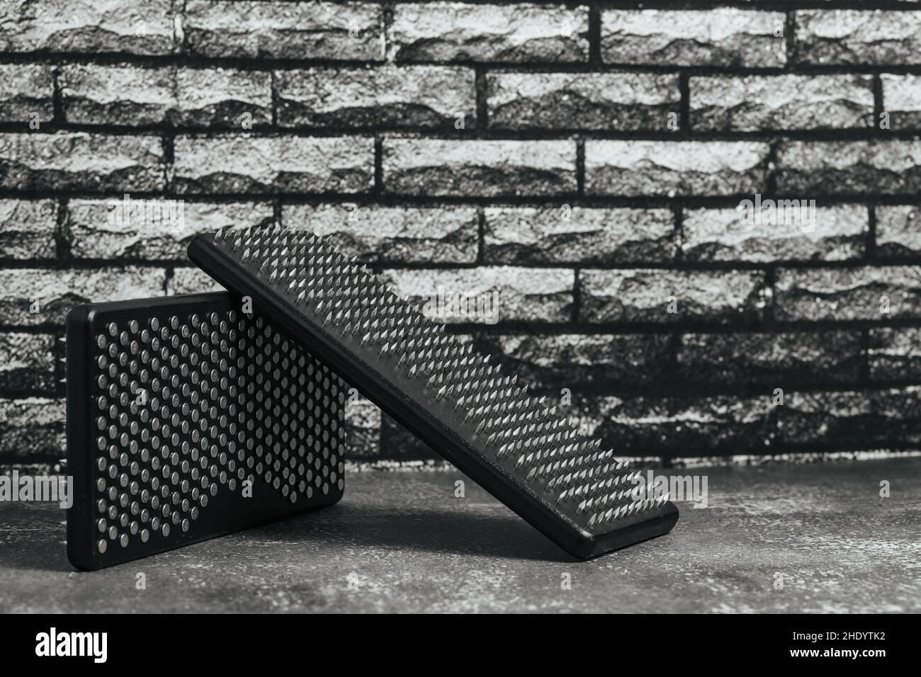 The concept of meditation, standing on nails, therapy Stock Photo - Alamy