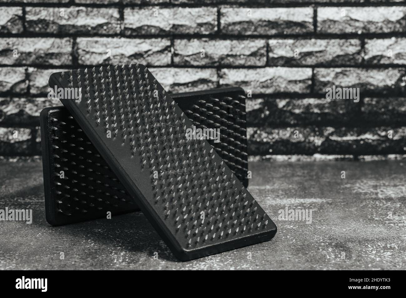 The concept of meditation, standing on nails, therapy Stock Photo - Alamy