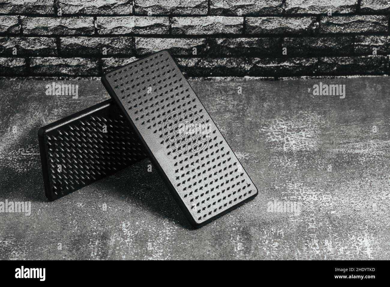 The concept of meditation, standing on nails, therapy Stock Photo - Alamy