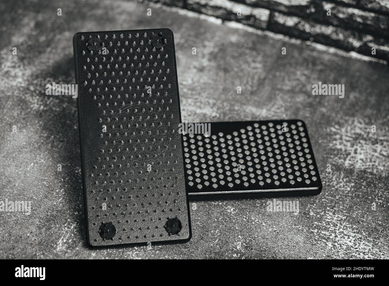 The concept of meditation, standing on nails, therapy Stock Photo - Alamy