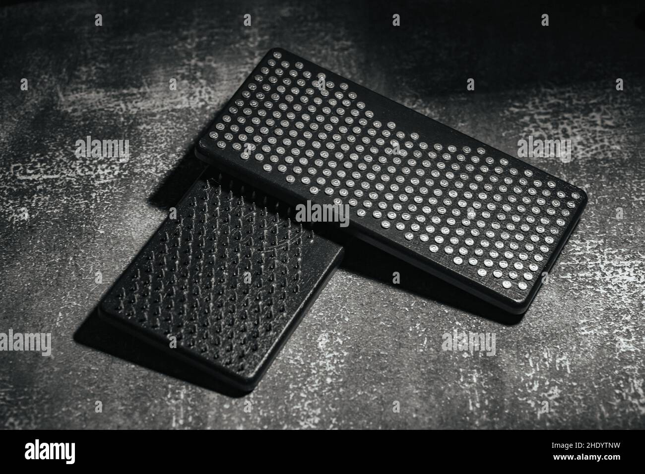 The concept of meditation, standing on nails, therapy Stock Photo - Alamy