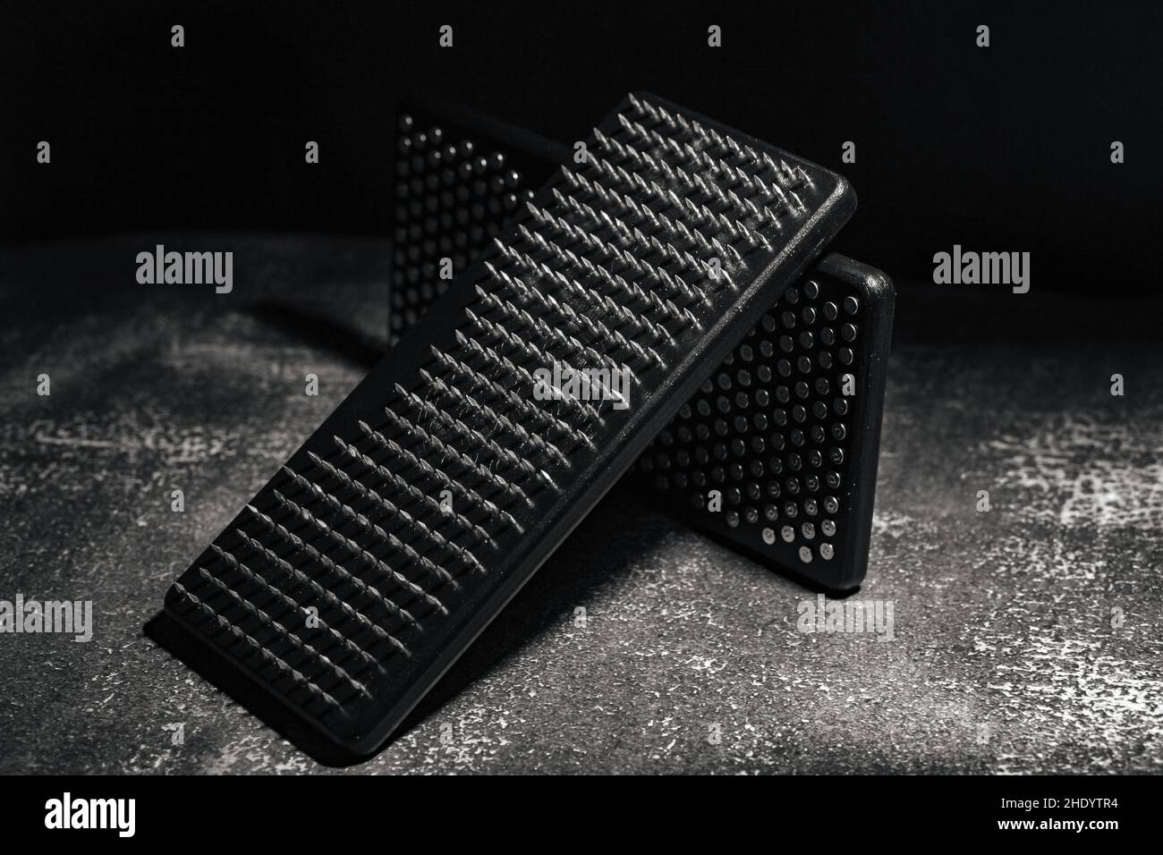 The concept of meditation, standing on nails, therapy Stock Photo - Alamy