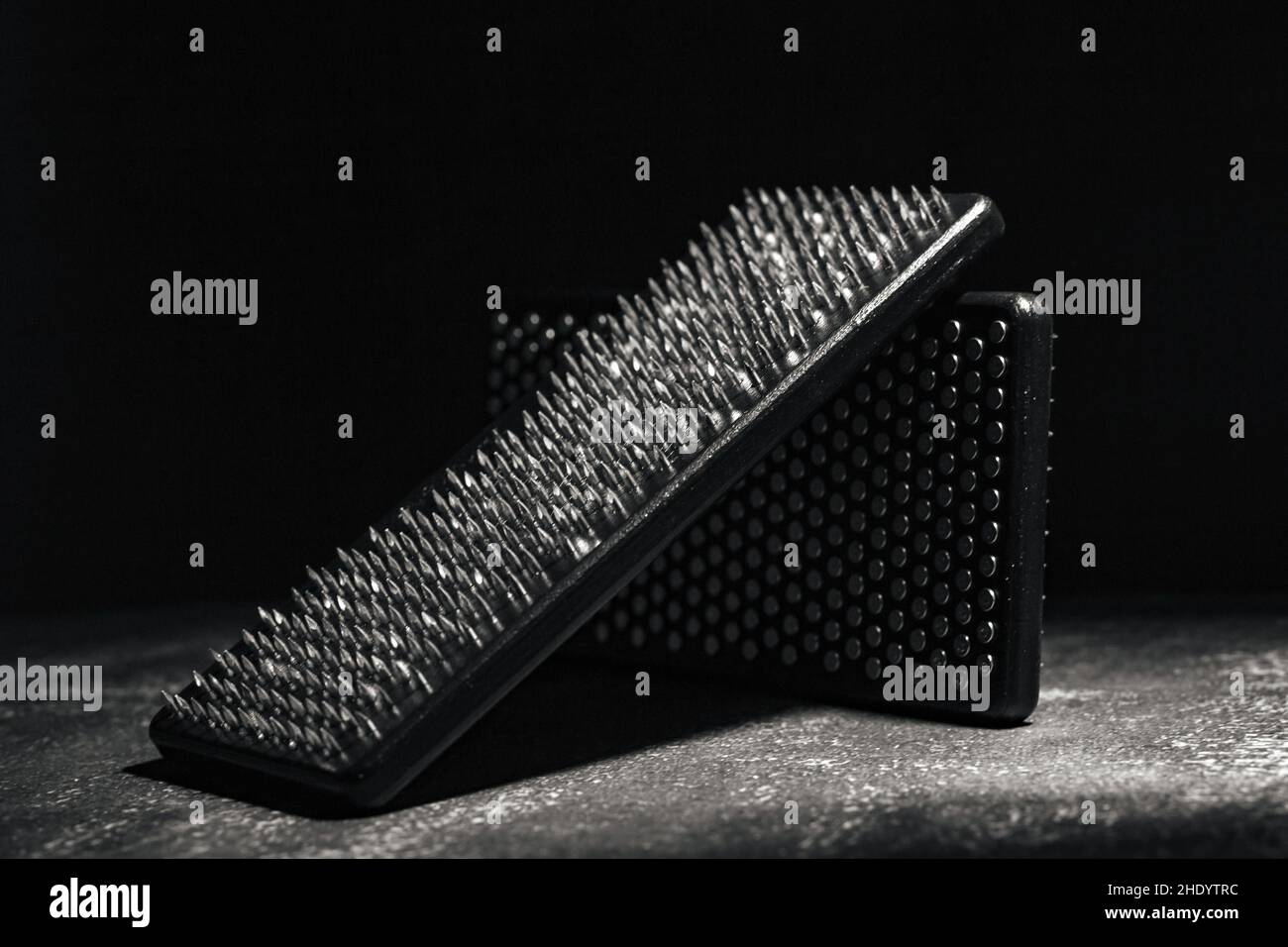 The concept of meditation, standing on nails, therapy Stock Photo - Alamy