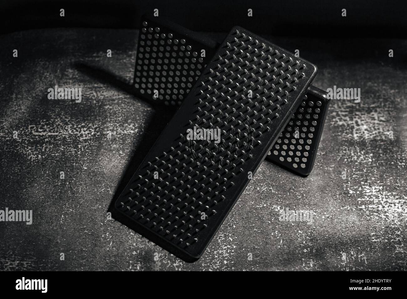 The concept of meditation, standing on nails, therapy Stock Photo - Alamy