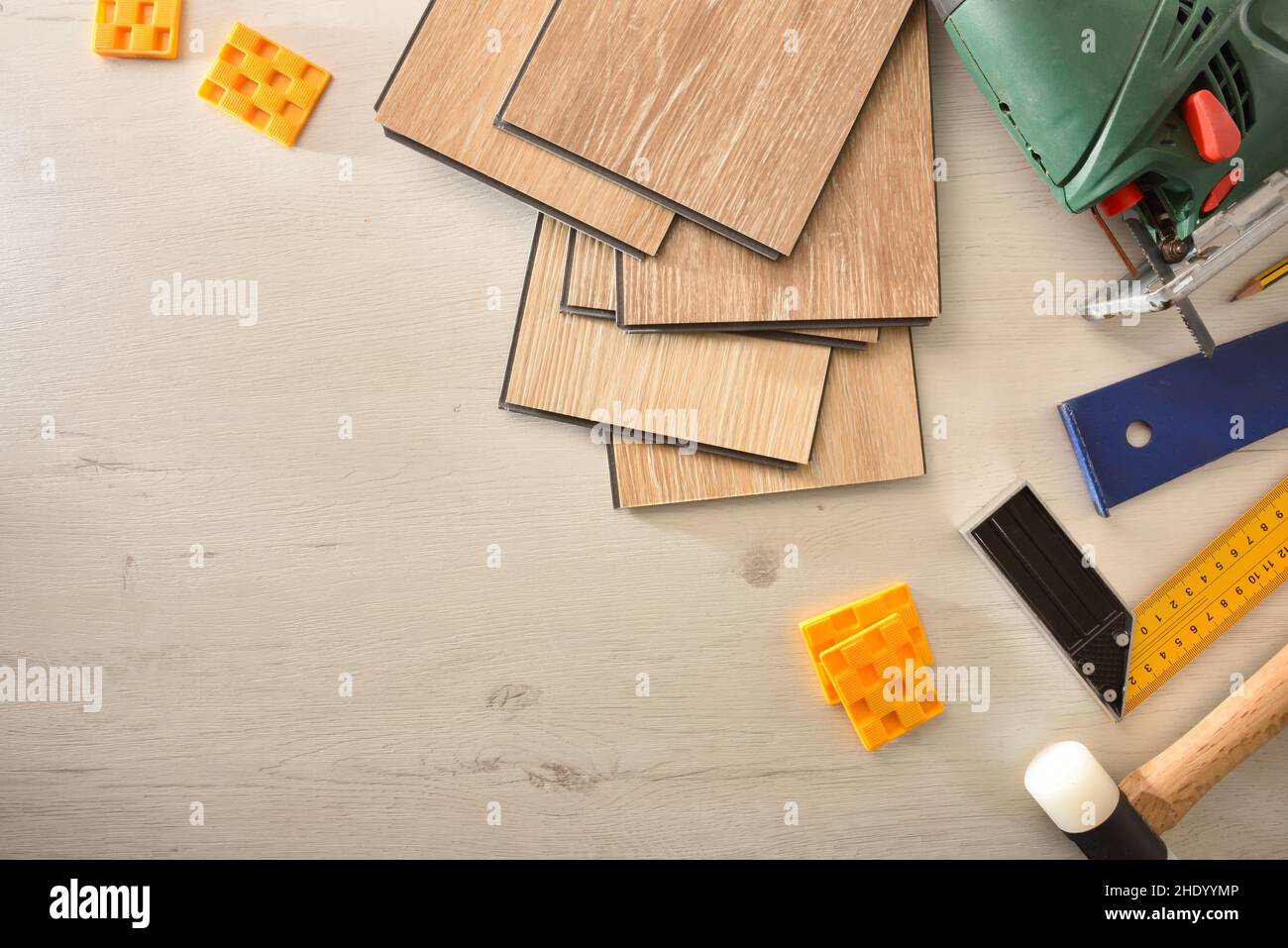 Parquet slats and tools for DIY at home on wood table top. Top view ...