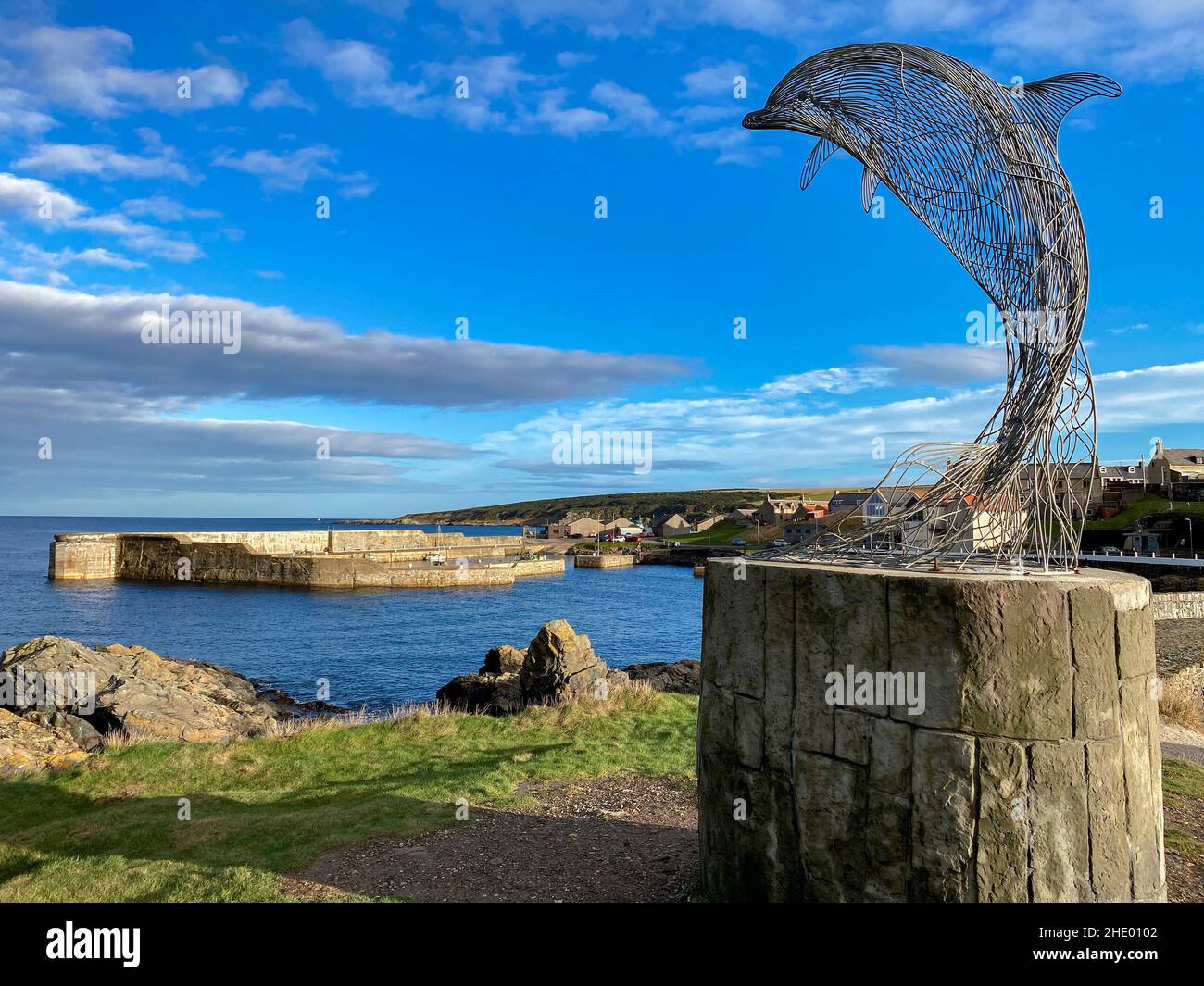 The dolphin monument and the ‘new’ harbor at Portsoy, a small coastal ...