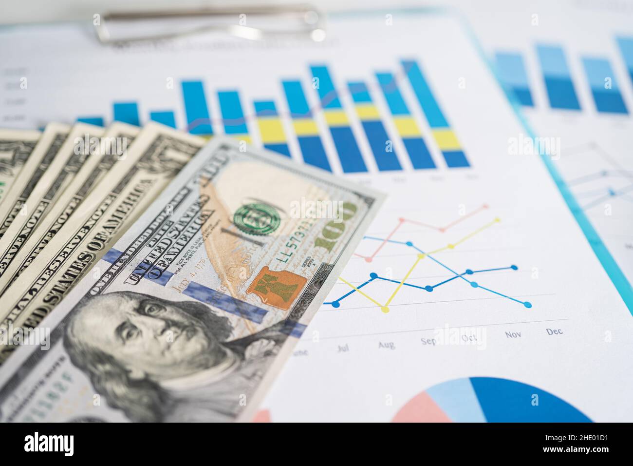 US dollar banknote on charts graphs paper. Financial development ...