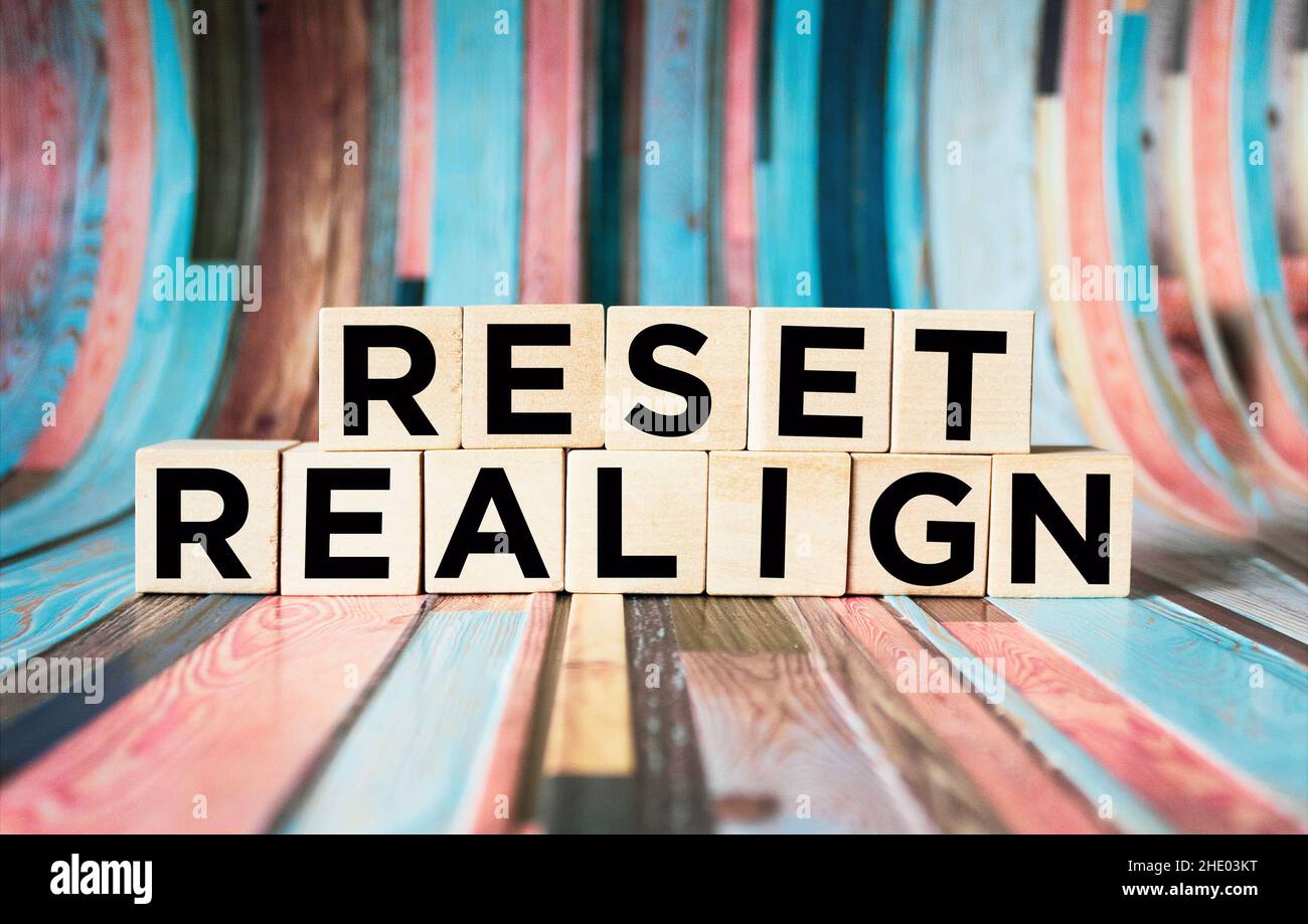 reset, realign concept - abstract words written on wooden blocks Stock ...