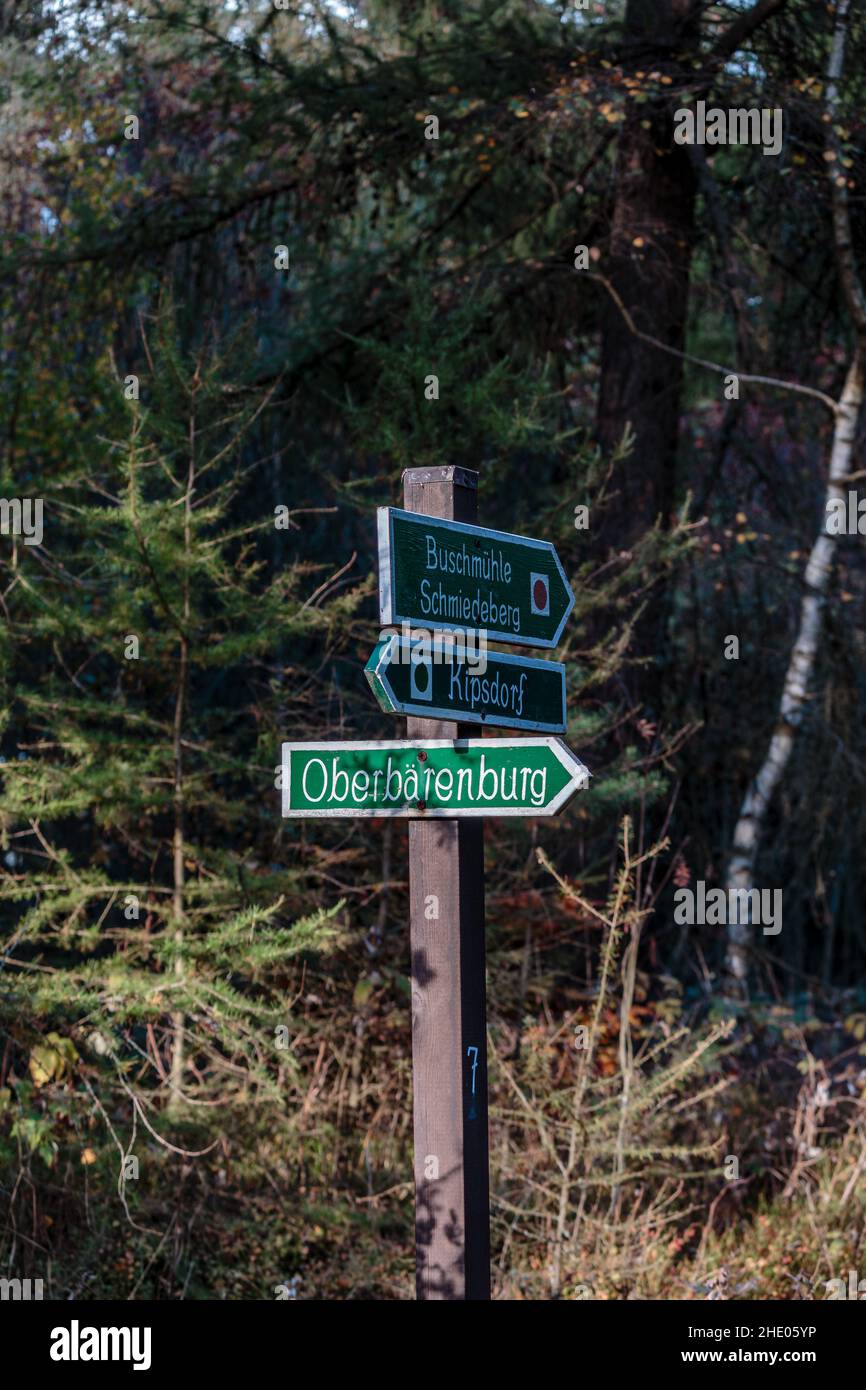 Sign post in a german forest Stock Photo - Alamy