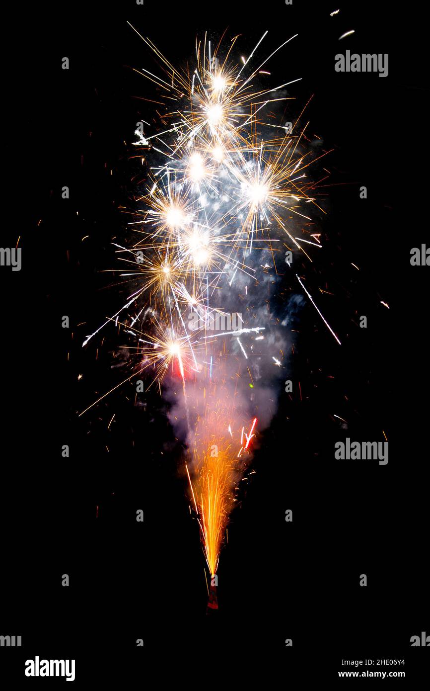 Bright colored fireworks stand out against a black background. Bright ...