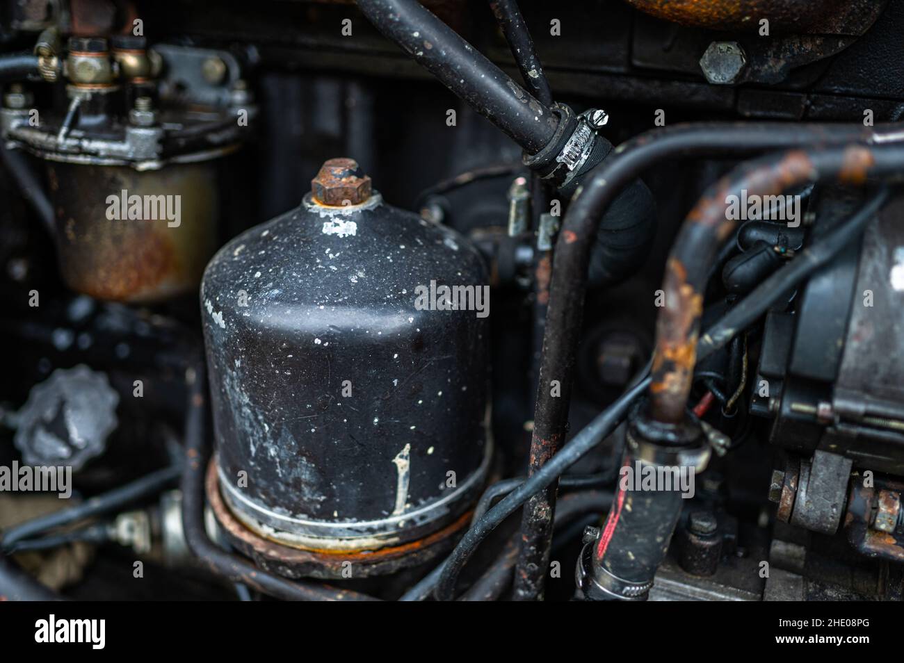 A close-up of a part of the tractor's engine Stock Photo - Alamy