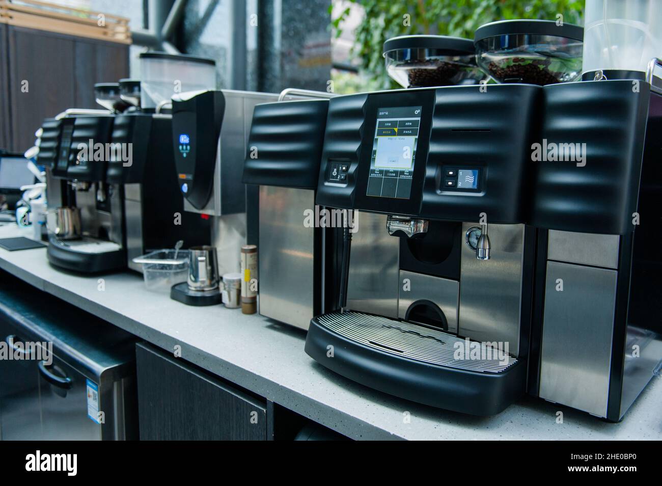 Coffee making machines on a shelf Stock Photo - Alamy