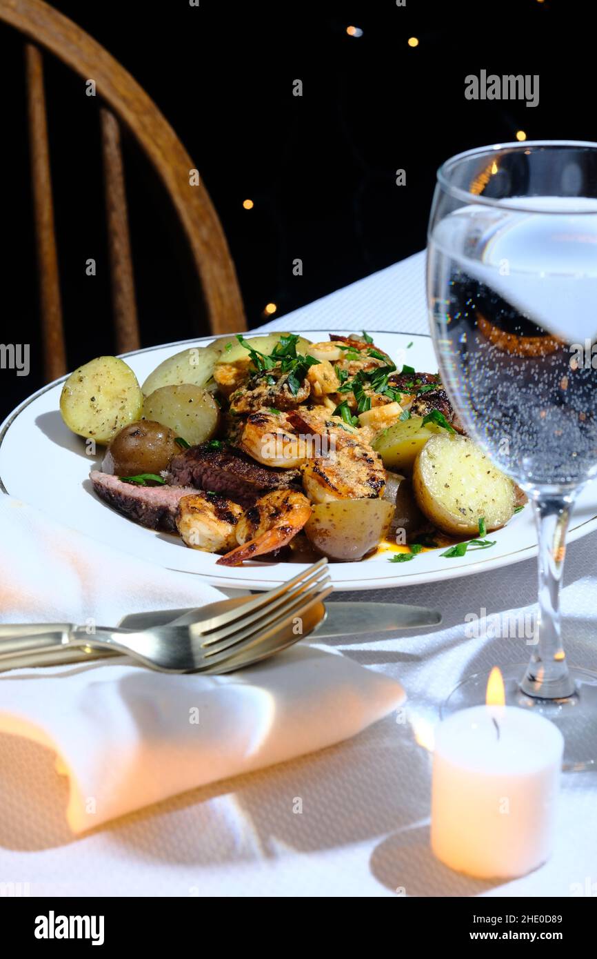 Gourmet surf and turf cajun shrimp and steak dinner entree with new ...