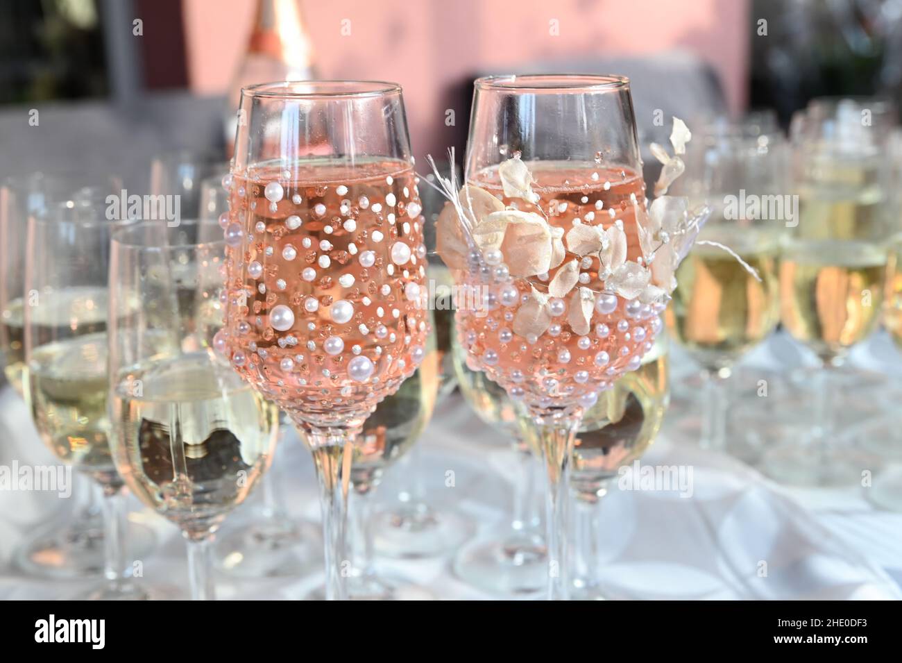 Glasses of pink champagne at the wedding reception Stock Photo - Alamy