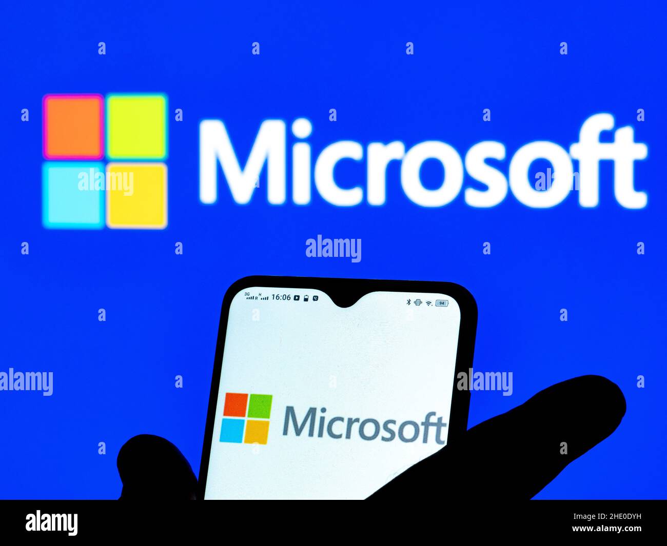 In this photo illustration a Microsoft logo seen displayed on a ...