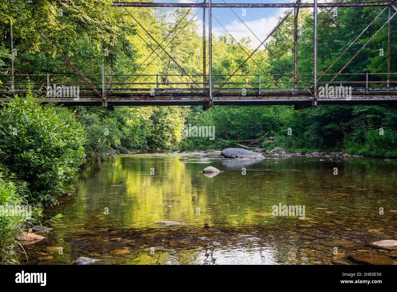 Pigeon River in North Carolina with old bridge spanning across the ...