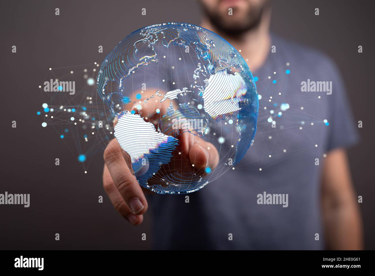 Businessman tapping on a floating render of a globe outline- global network connection concept ...