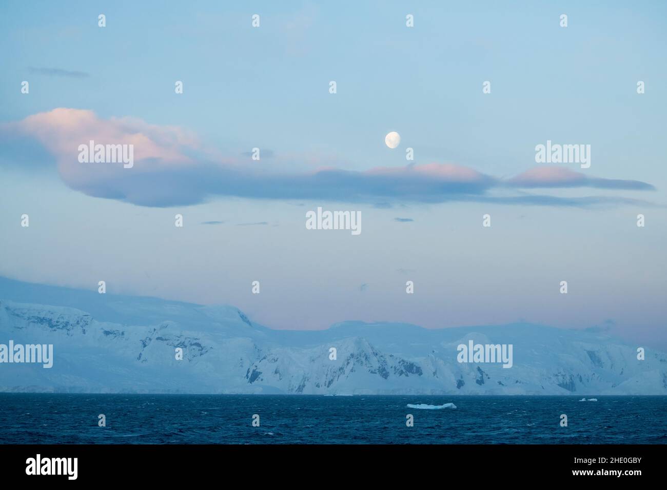 Moon over Antarctica at twilight Stock Photo - Alamy