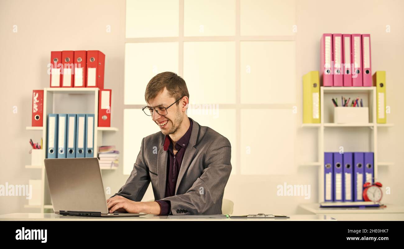 Man with laptop computer work in office, web developer concept Stock ...