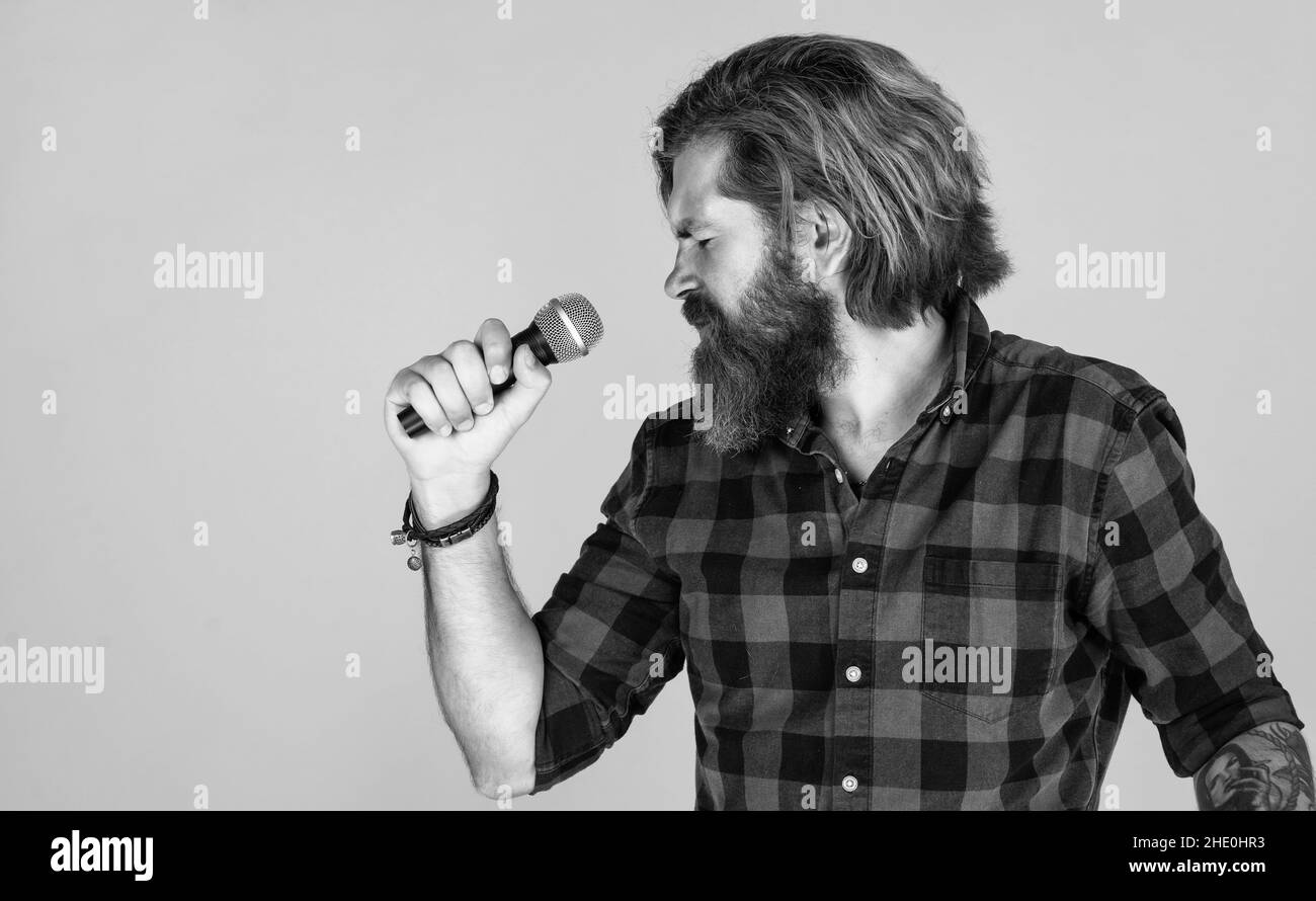Young male microphone stage Black and White Stock Photos & Images - Alamy