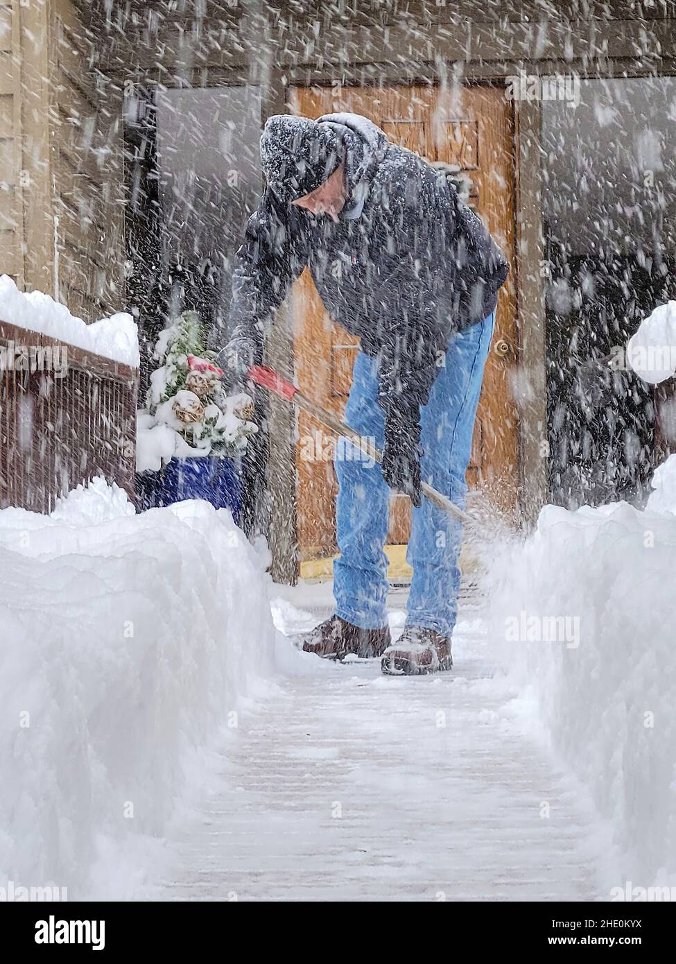 Man shoveling snow winter home hi-res stock photography and images - Alamy
