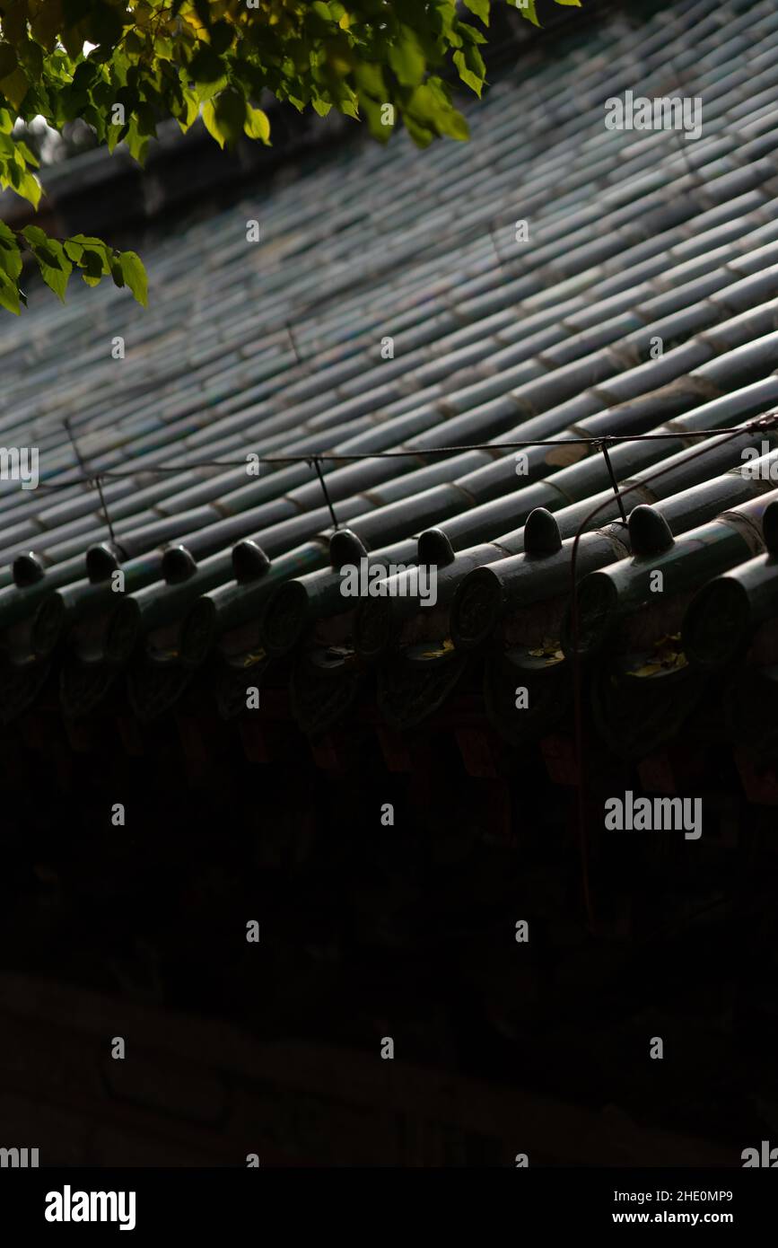 Vertical shot of a building's roof with tiles Stock Photo - Alamy