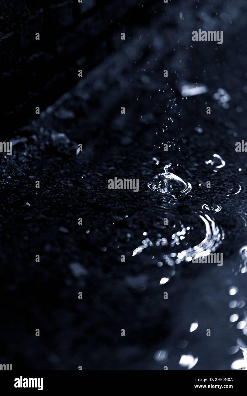 Rain drops puddle hi-res stock photography and images - Alamy