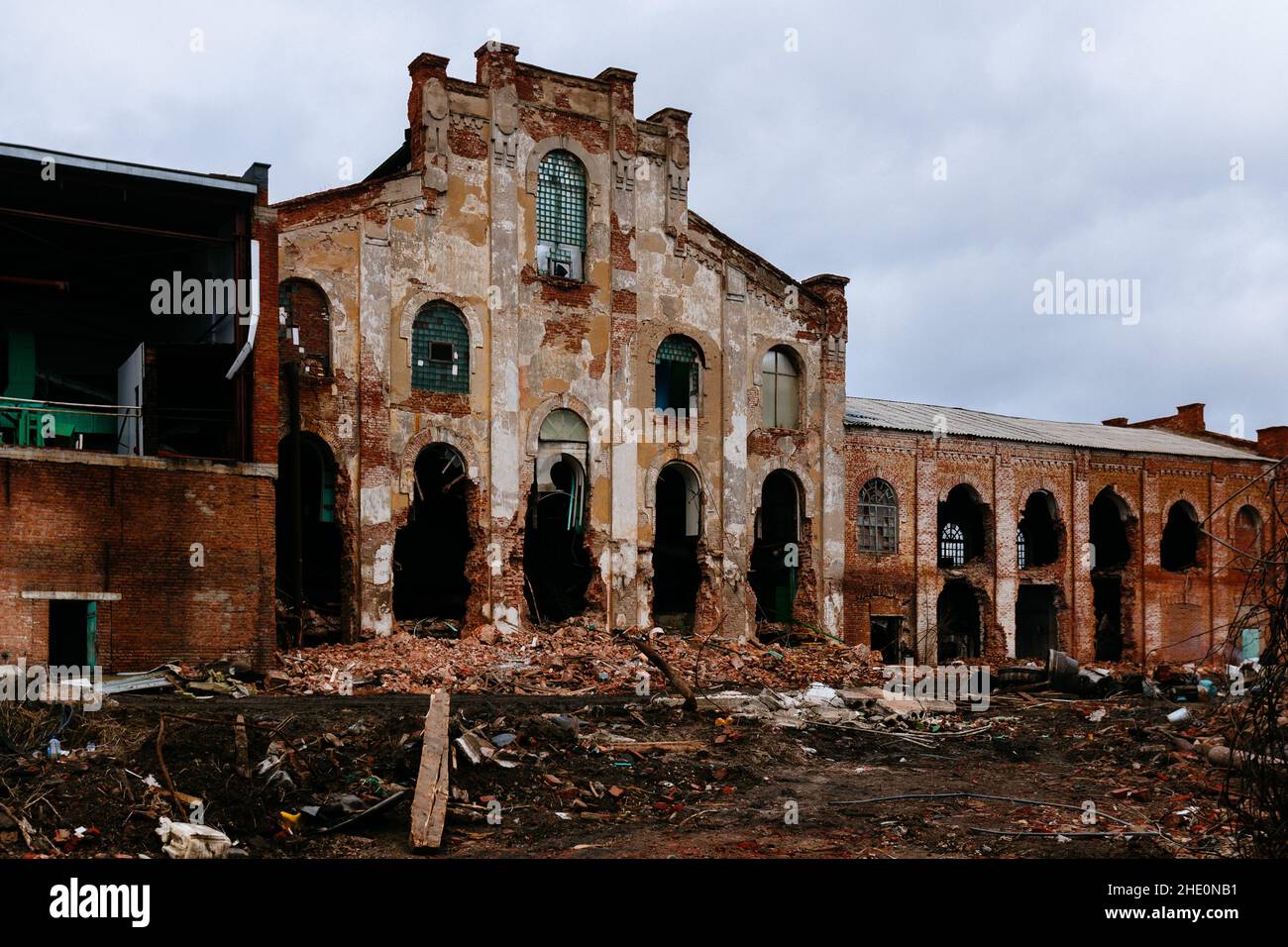 Demolished abandoned old red brick industrial building Stock Photo - Alamy