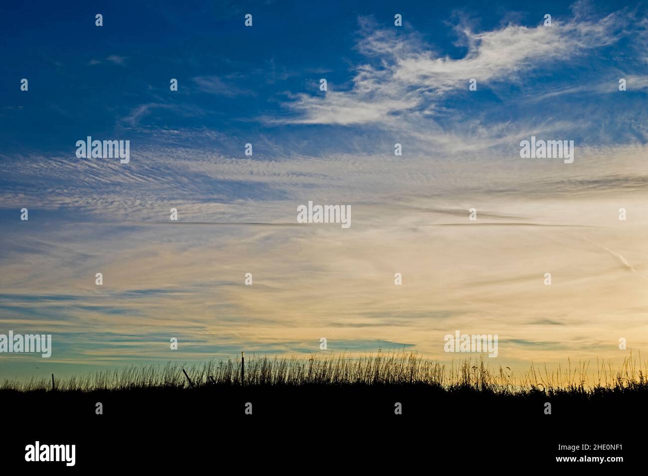 Dramatic clouds over an Iowa field at sunset Stock Photo - Alamy