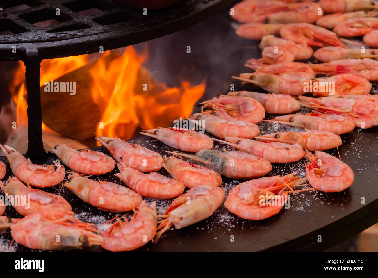 Process of grilling red king prawns on brazier with hot flame Stock ...