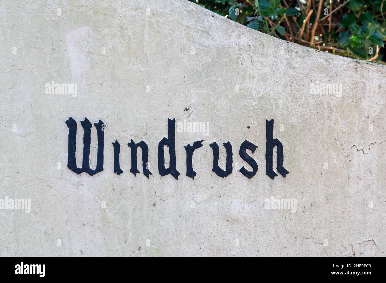 Windrush, house name on a wall, UK Stock Photo - Alamy